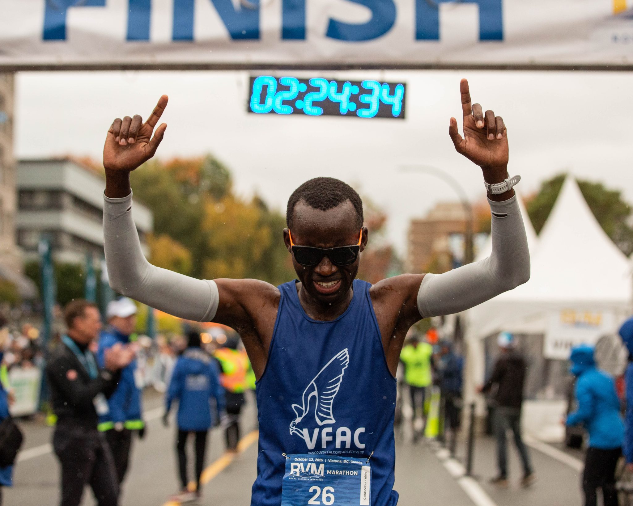 Royal Victoria Marathon runners set records despite the rain